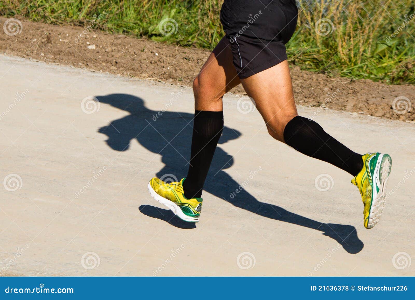Shadow of a runner stock photo. Image of condition, asphalt - 21636378