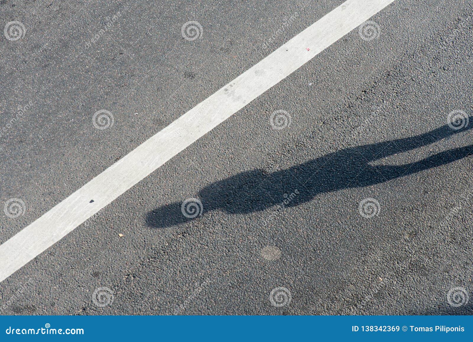 Shadow of a Runner on the Road Stock Image - Image of road, dark: 138342369