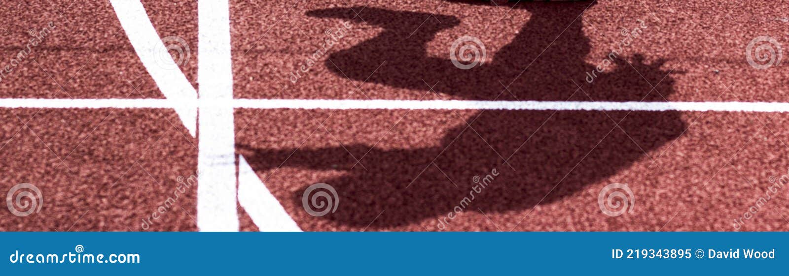Shadow of Runners Sprinting on a Red Track Stock Image - Image of ...