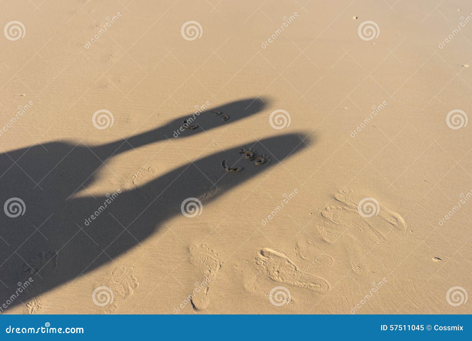 Shadow on sand feel happy stock image. Image of beach - 57511045