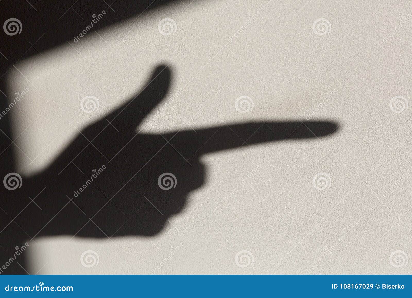 Shadow in the shape of gun stock image. Image of surface - 108167029