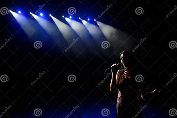 Shadow of Singer in Light on the Stage Stock Image - Image of broadway ...
