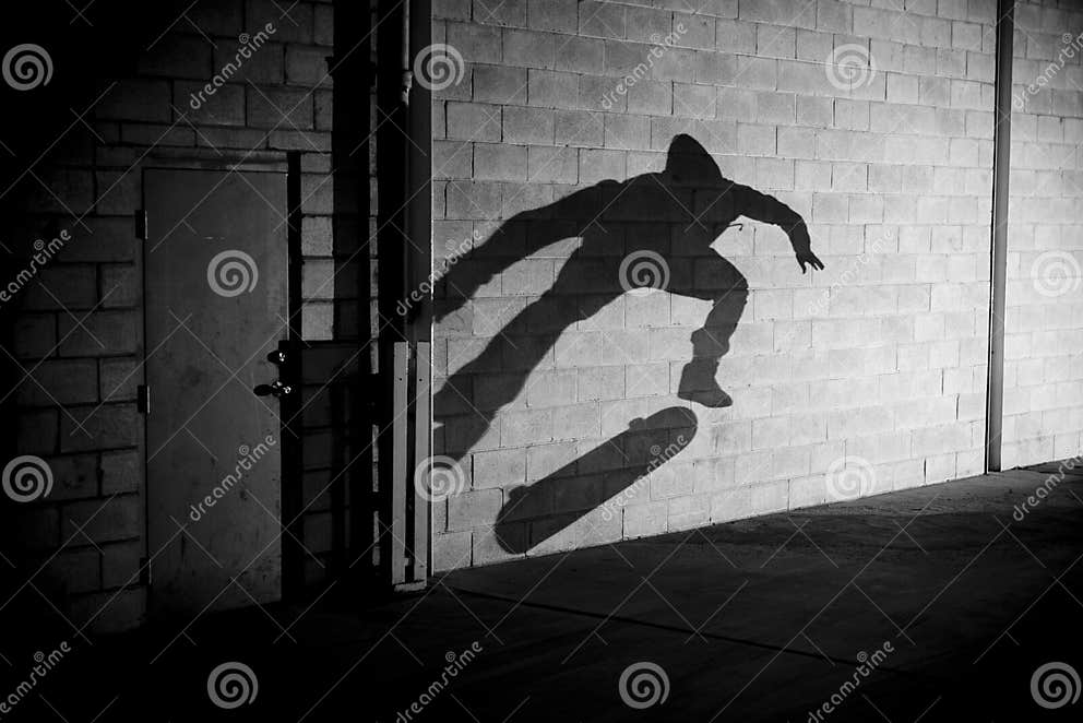 Shadow skateboarder stock photo. Image of jump, wall - 23971176