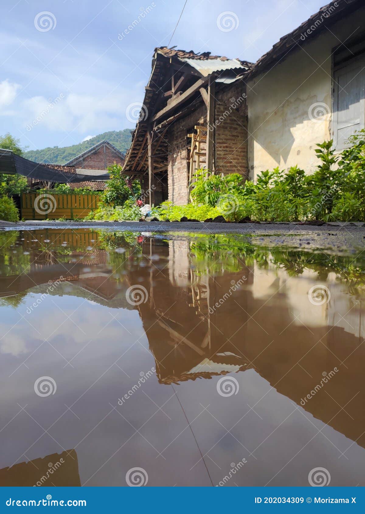 The shadow of a slum house stock image. Image of waterphotography ...
