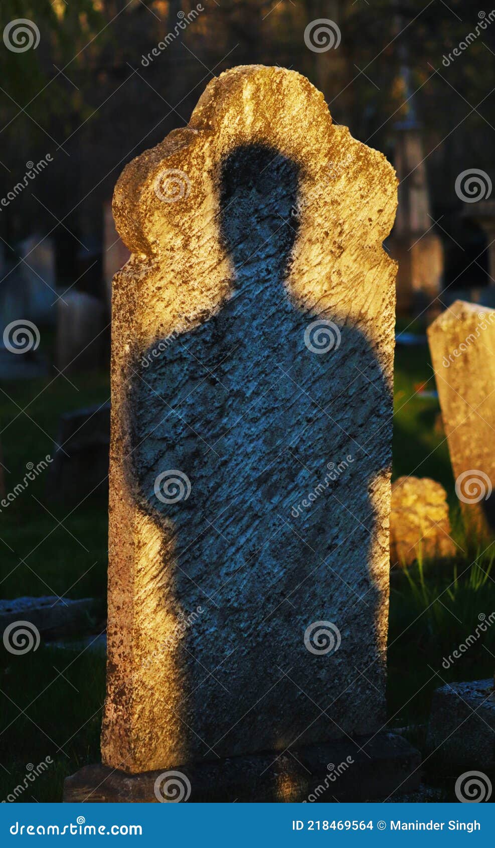 Shadow on tombstone. stock photo. Image of scotia, graveyard - 218469564