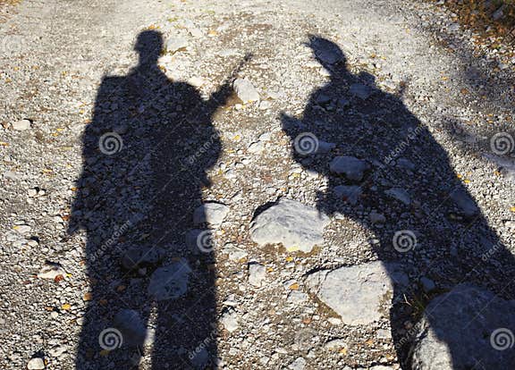 Shadow of two armed men stock photo. Image of black, view - 16760512