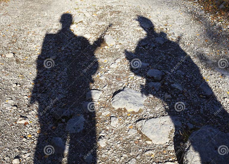 Shadow of two armed men stock photo. Image of black, view - 16760512