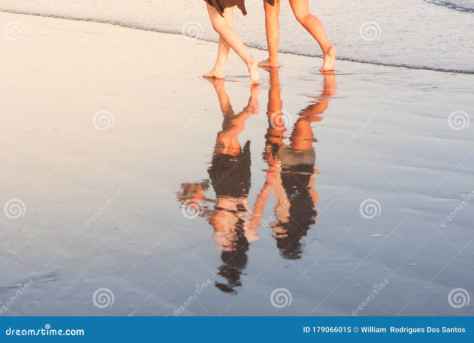 Shadow of Two Girls Holding Hands Walking by the Beach Stock Image ...