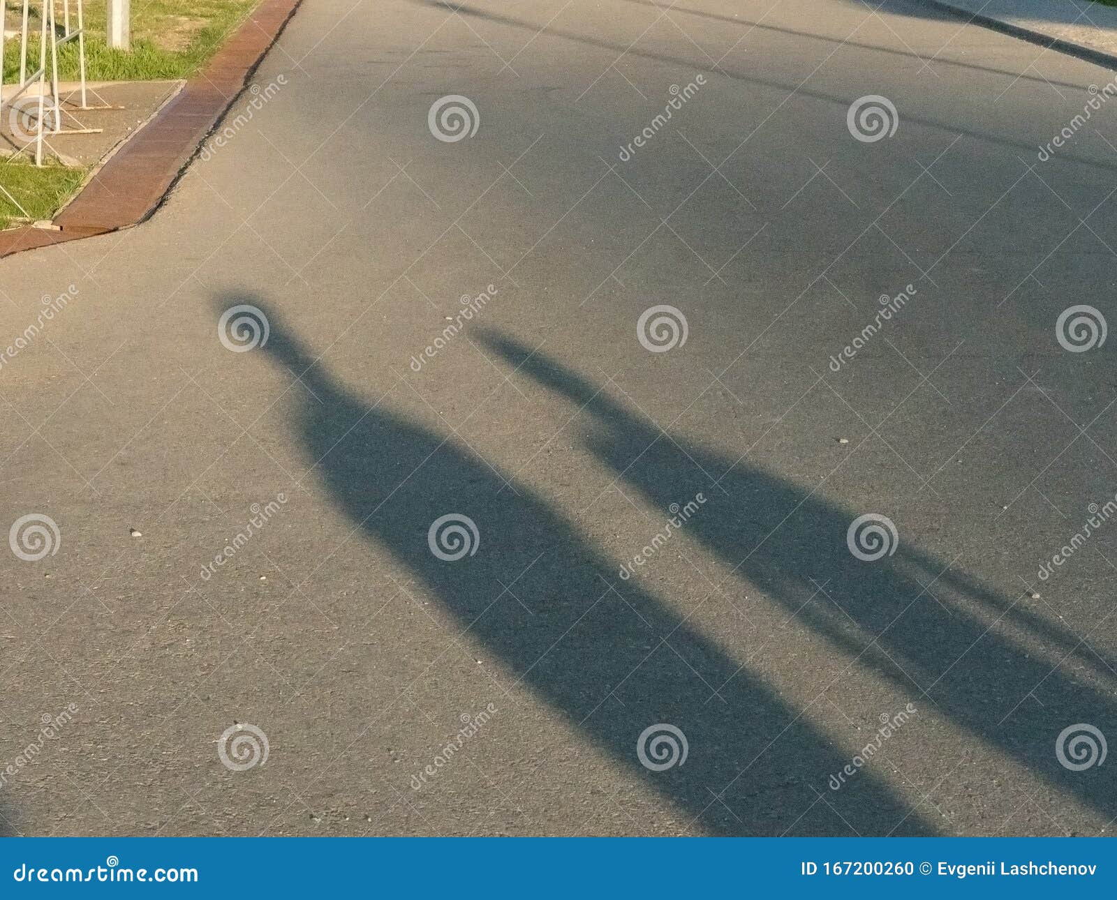 Shadow of Two People on the Road in the Evening Stock Photo - Image of ...