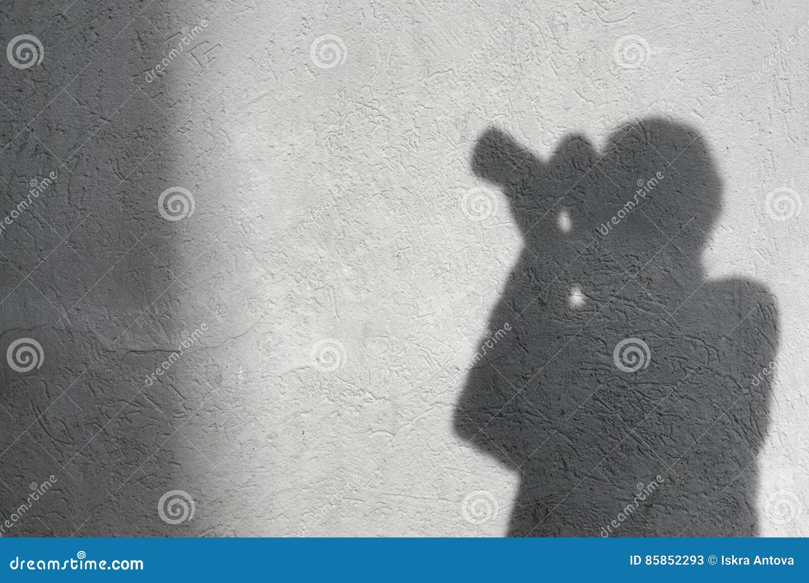 Shadow of Unrecognizable,unknown Photographer on the White Wall Stock ...