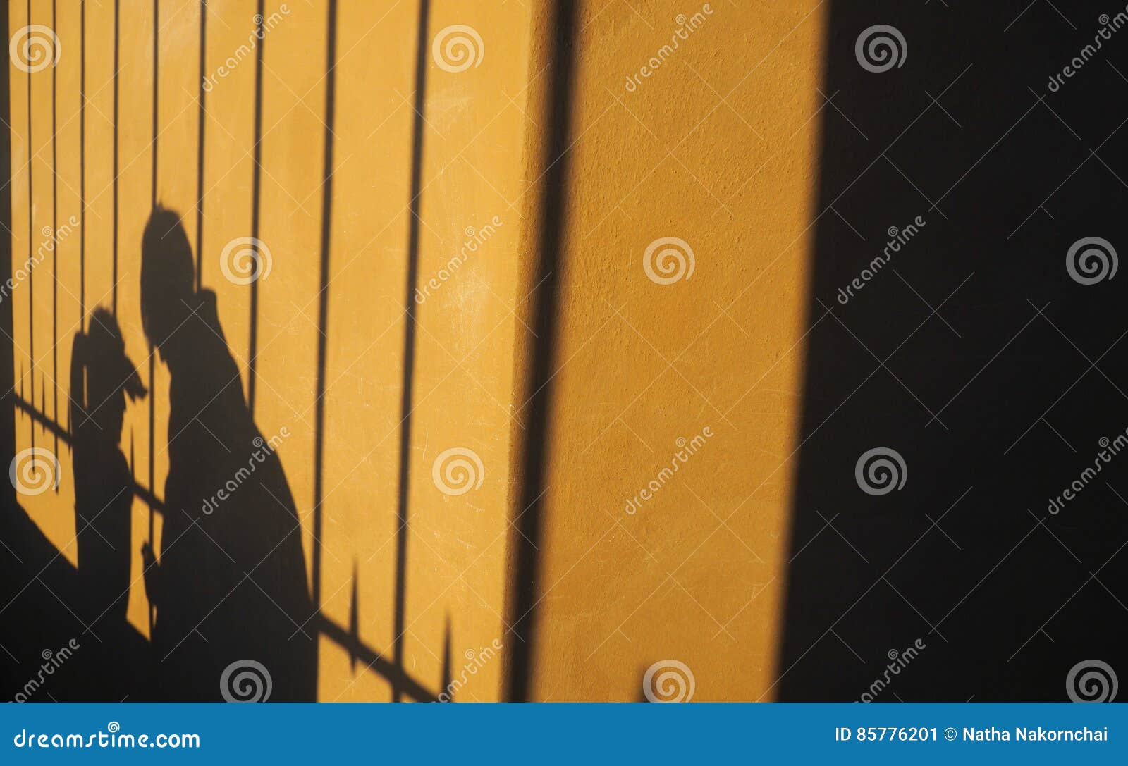 Shadow on the Wall of a Man and a Woman Stock Image - Image of shadows ...