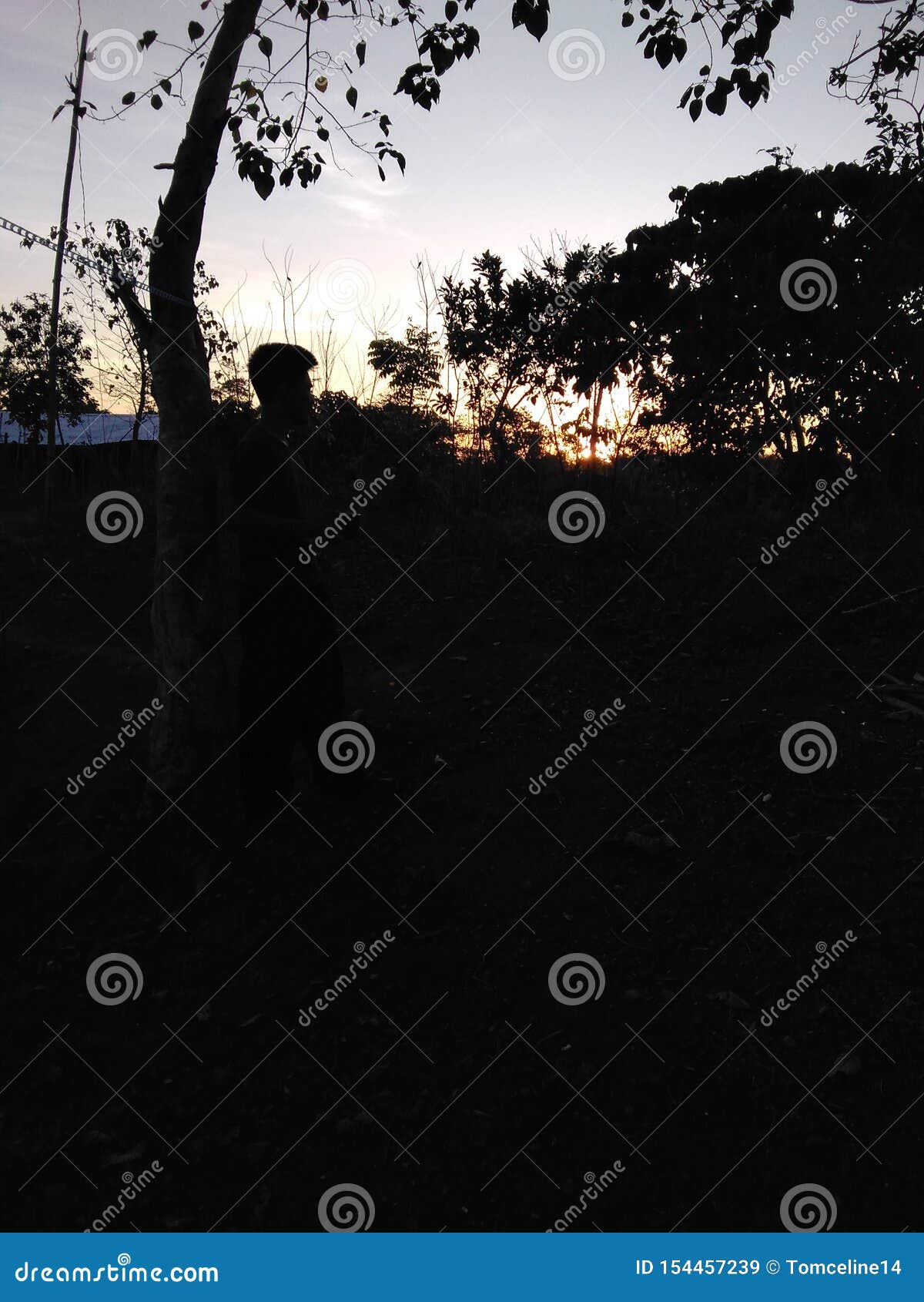 Shadow stock image. Image of watching, sunset, setting - 154457239