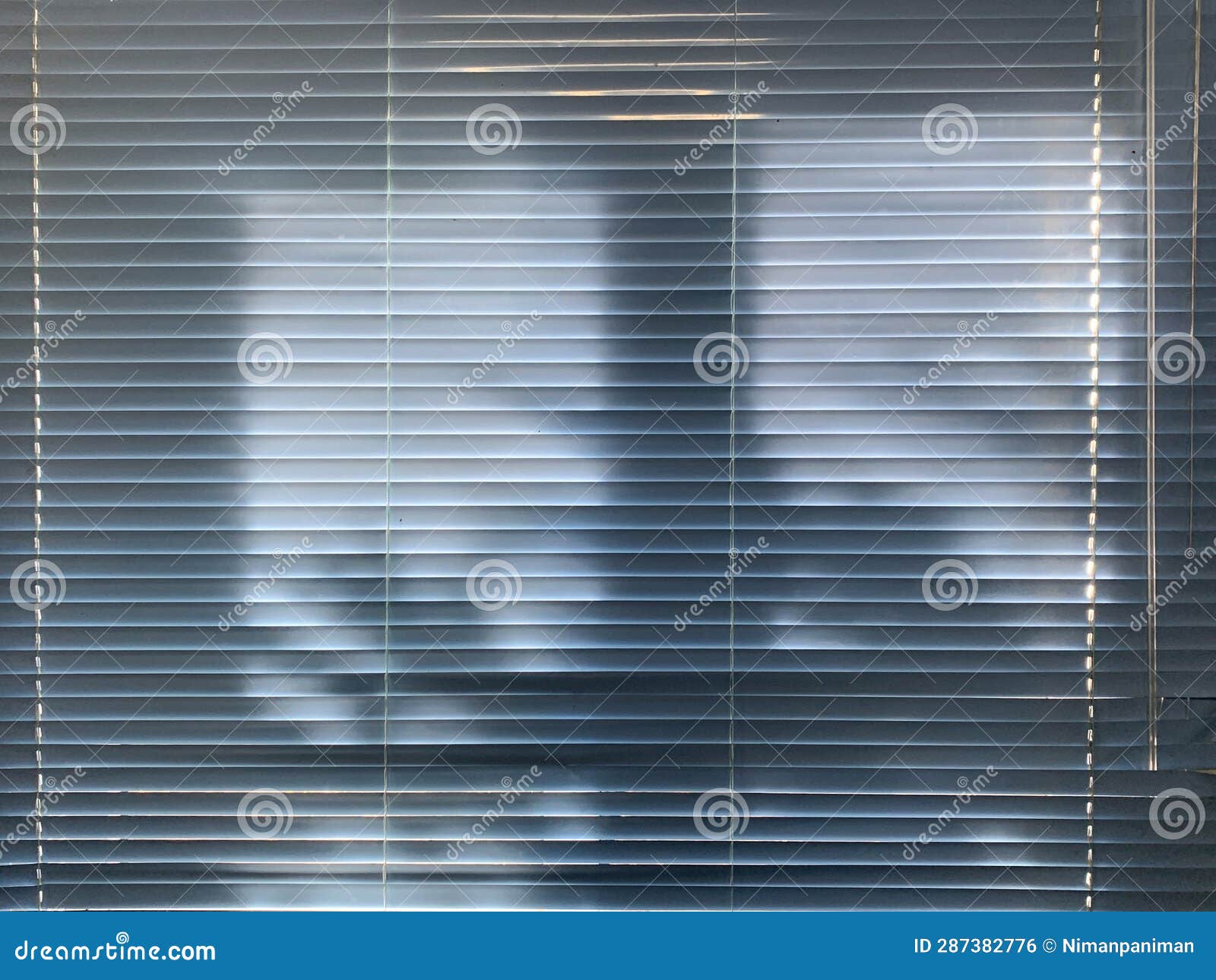 Shadow on a window blind stock photo. Image of blind - 287382776