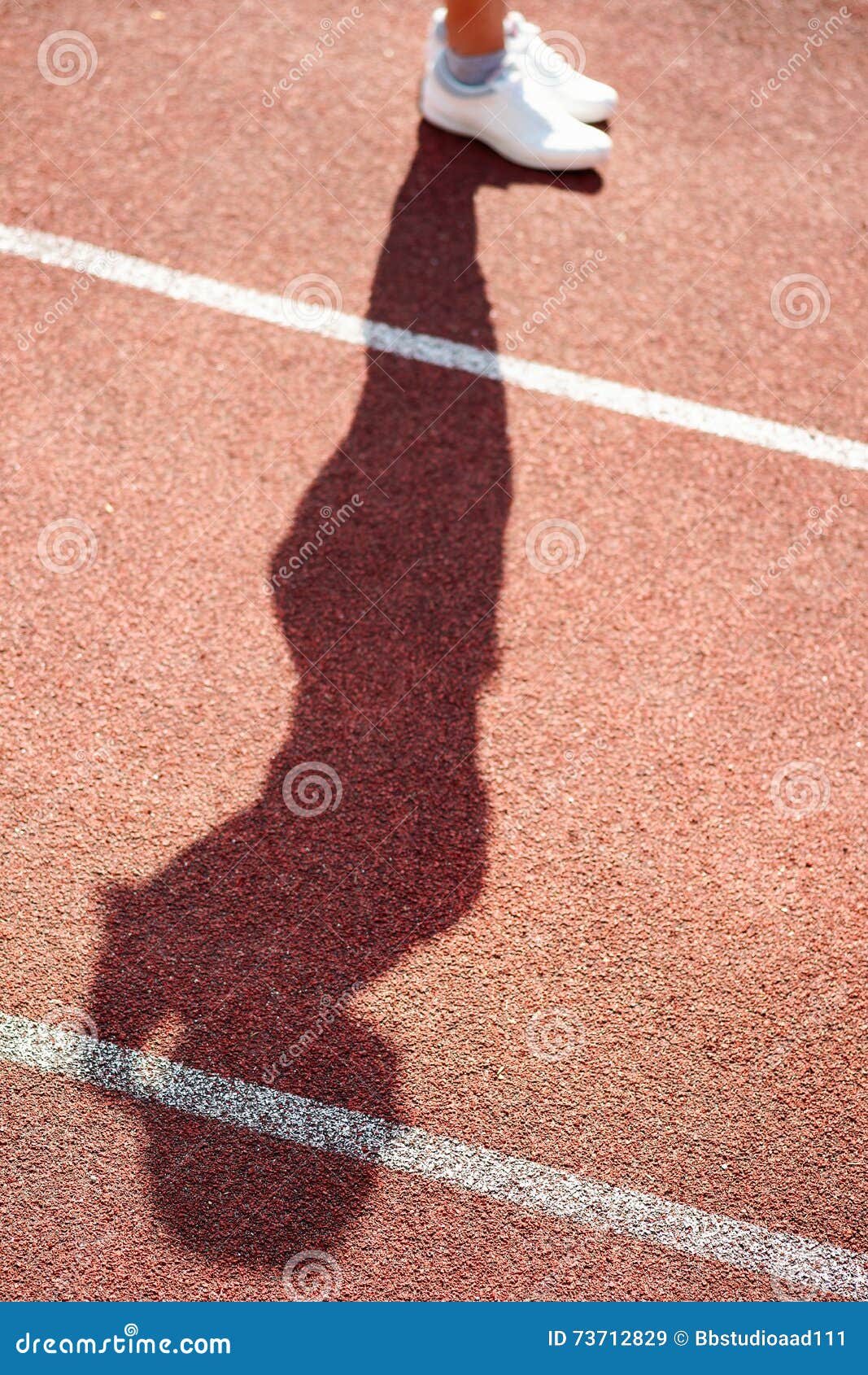 Shadow of Woman Athlete on Running Track Stock Image - Image of striped ...
