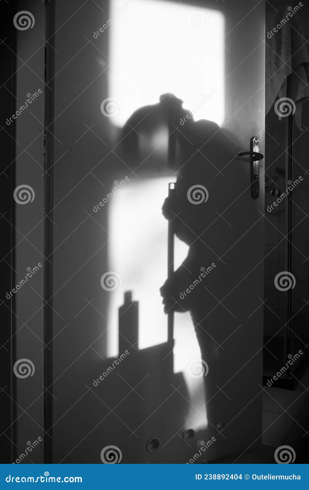 The Shadow of a Woman Sweeping in the Bathroom. Stock Photo - Image of ...