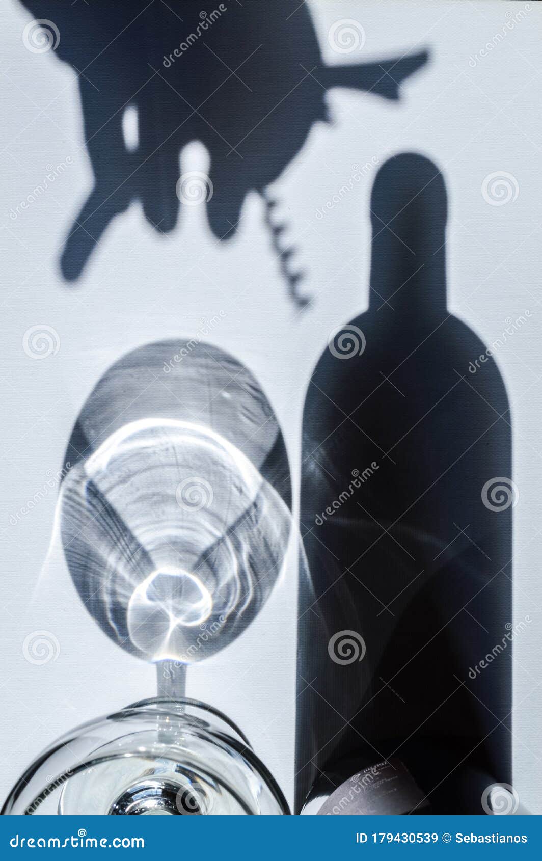 Shadows of a Bottle of Wine and Glass, and Shadow of Hand and Corkscrew ...