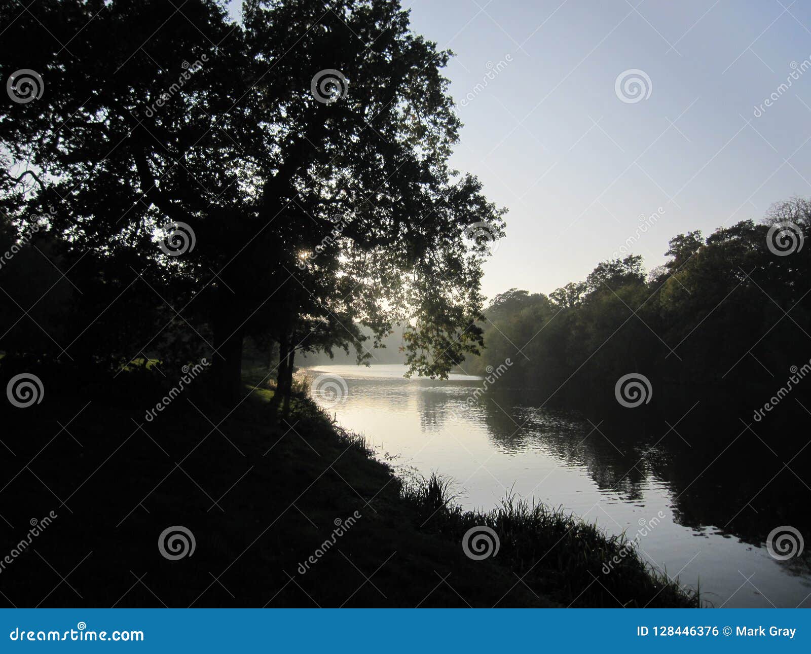 Shadows at Dusk stock photo. Image of river, shade, black - 128446376