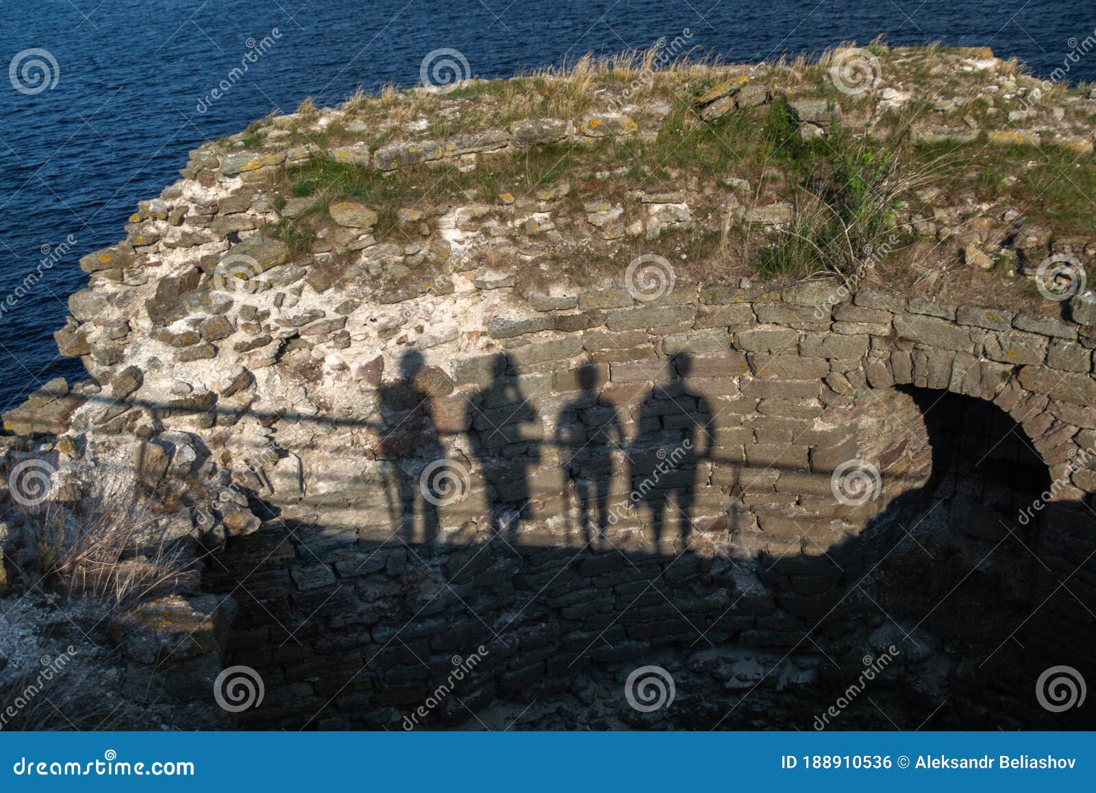 Shadows from Four People on the Wall Stock Photo - Image of sightseeing ...