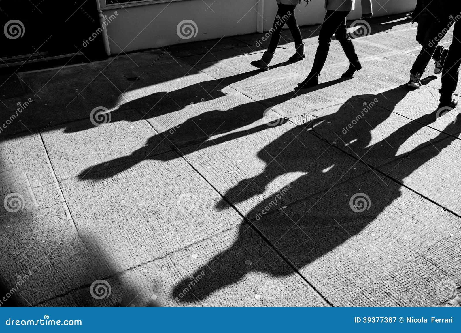 Shadows of Four Walking Pedestrians Stock Image - Image of shopping ...