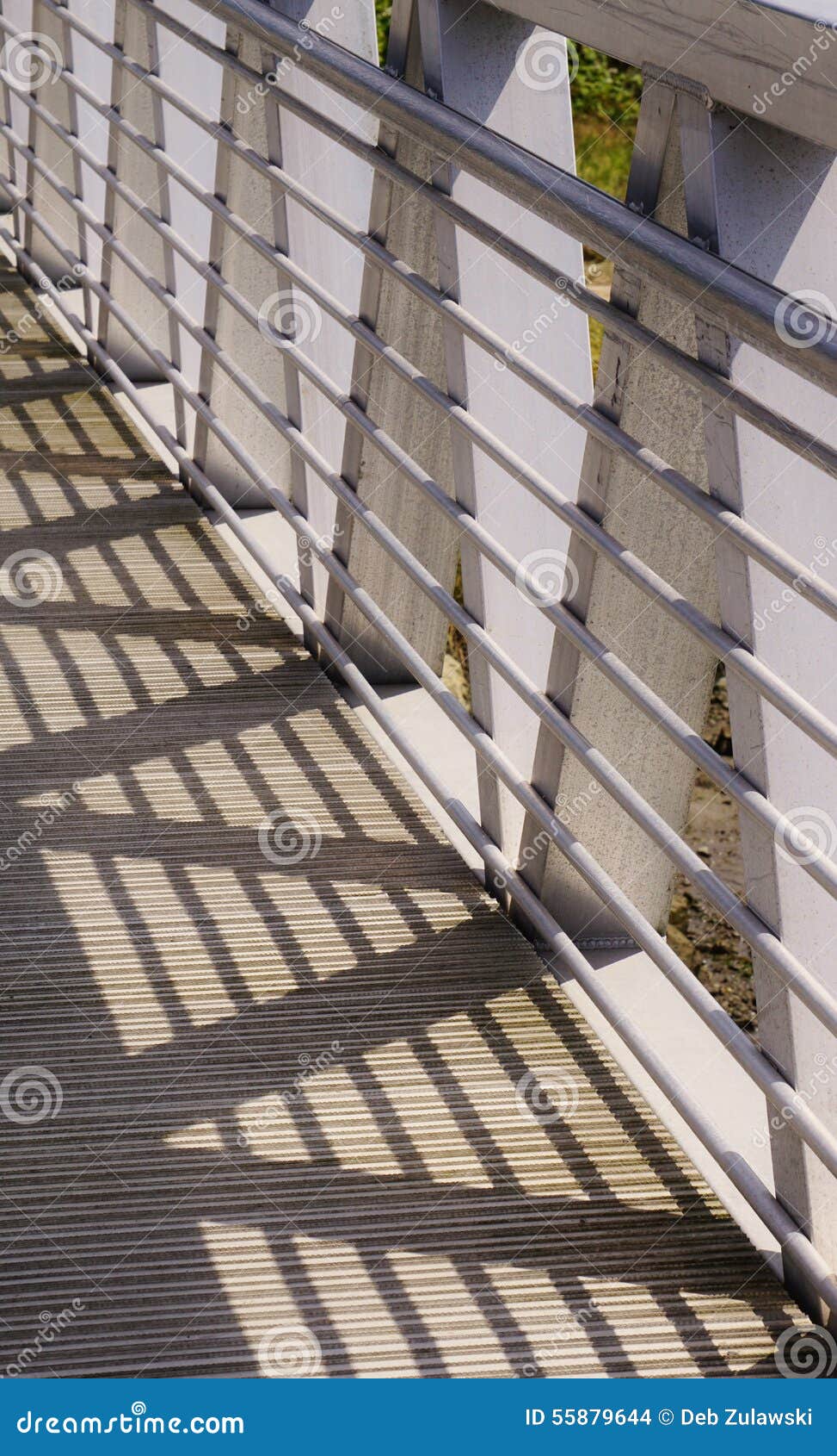 Shadows from Geometric Steel Railing on Bridge Stock Photo - Image of ...
