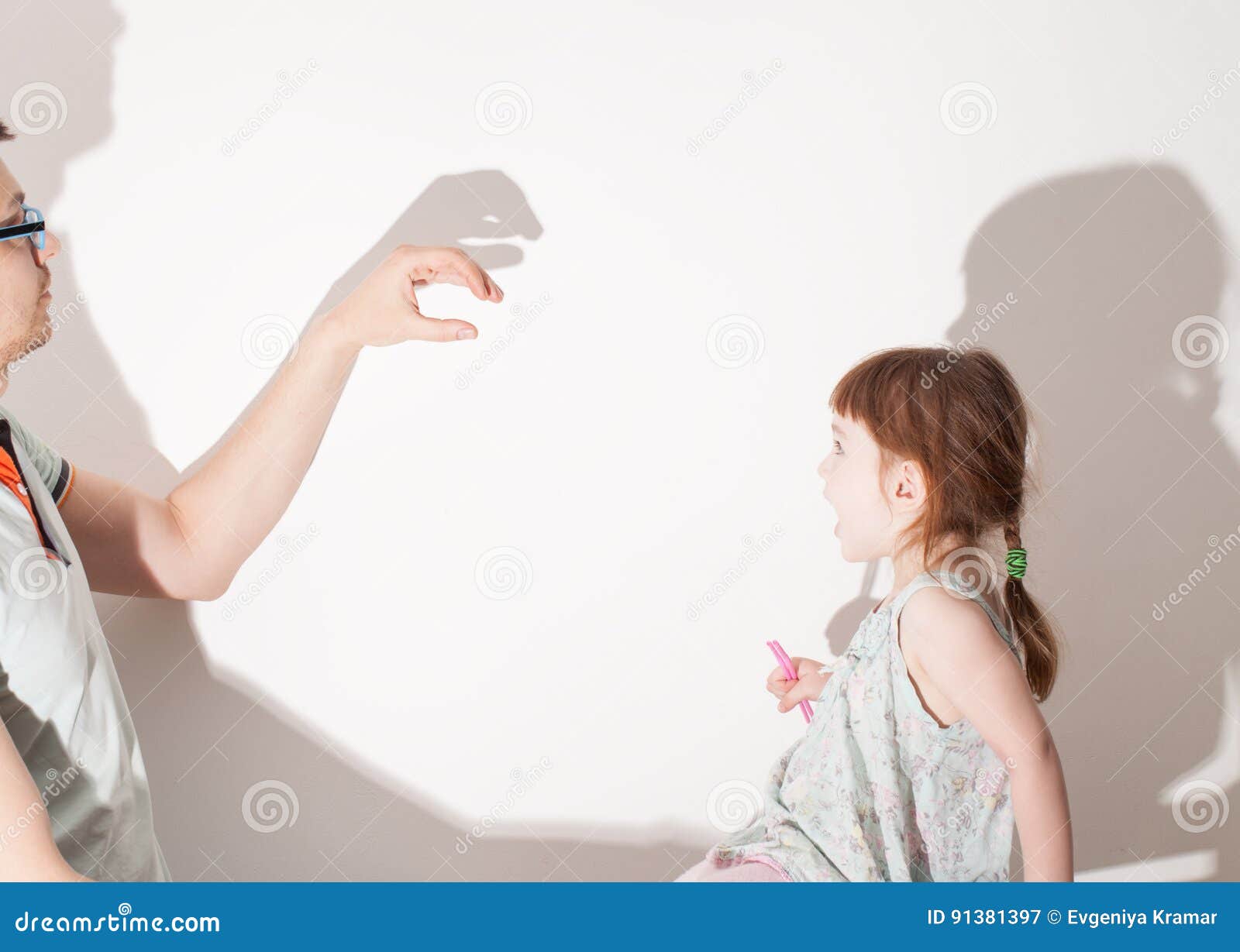 Shadows from the Hand on White Wall Stock Image - Image of imagination ...
