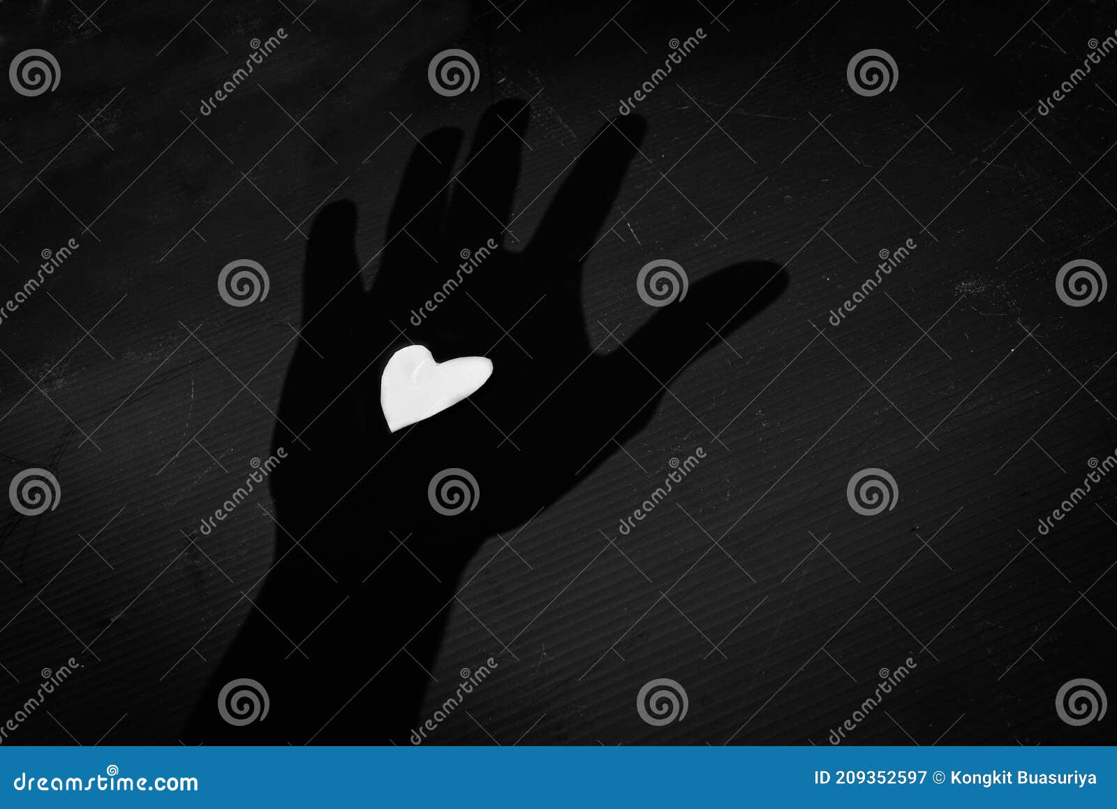 Shadows of Hands Holding a Mini Heart Valentines Day Stock Image ...
