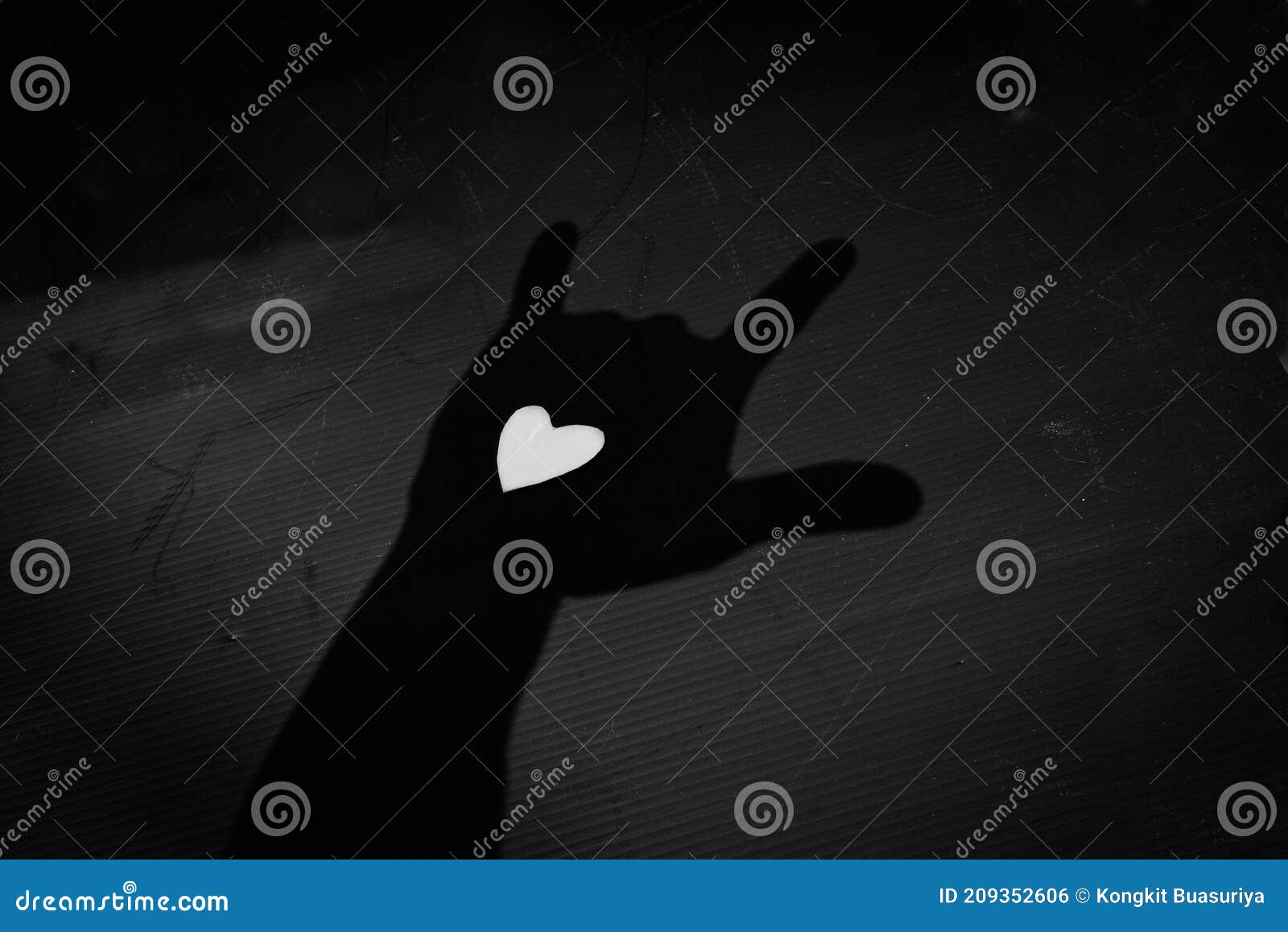 Shadows of Hands Holding a Mini Heart Valentines Day Stock Photo ...