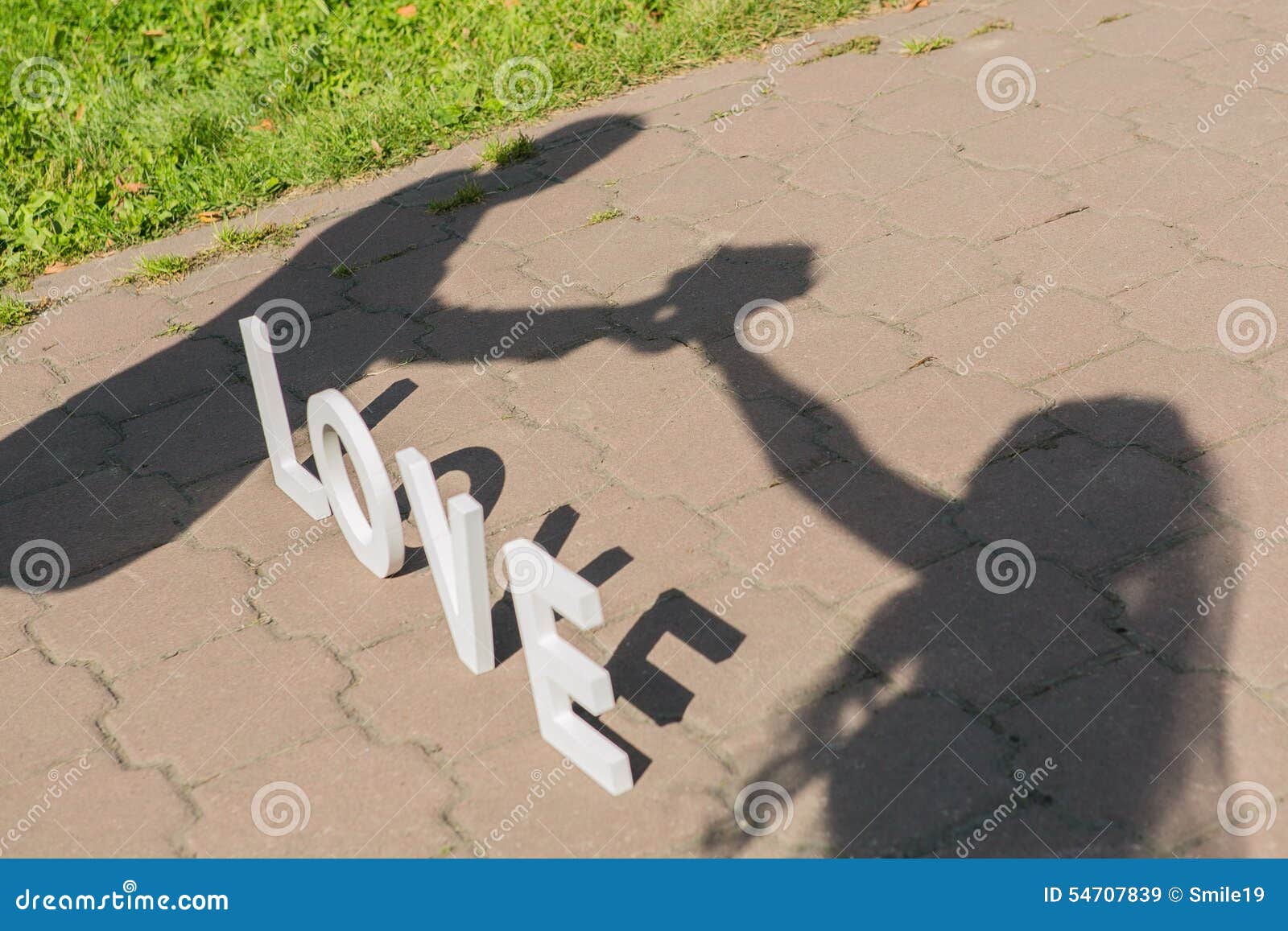 Shadows of love couple stock image. Image of shadow, beach - 54707839