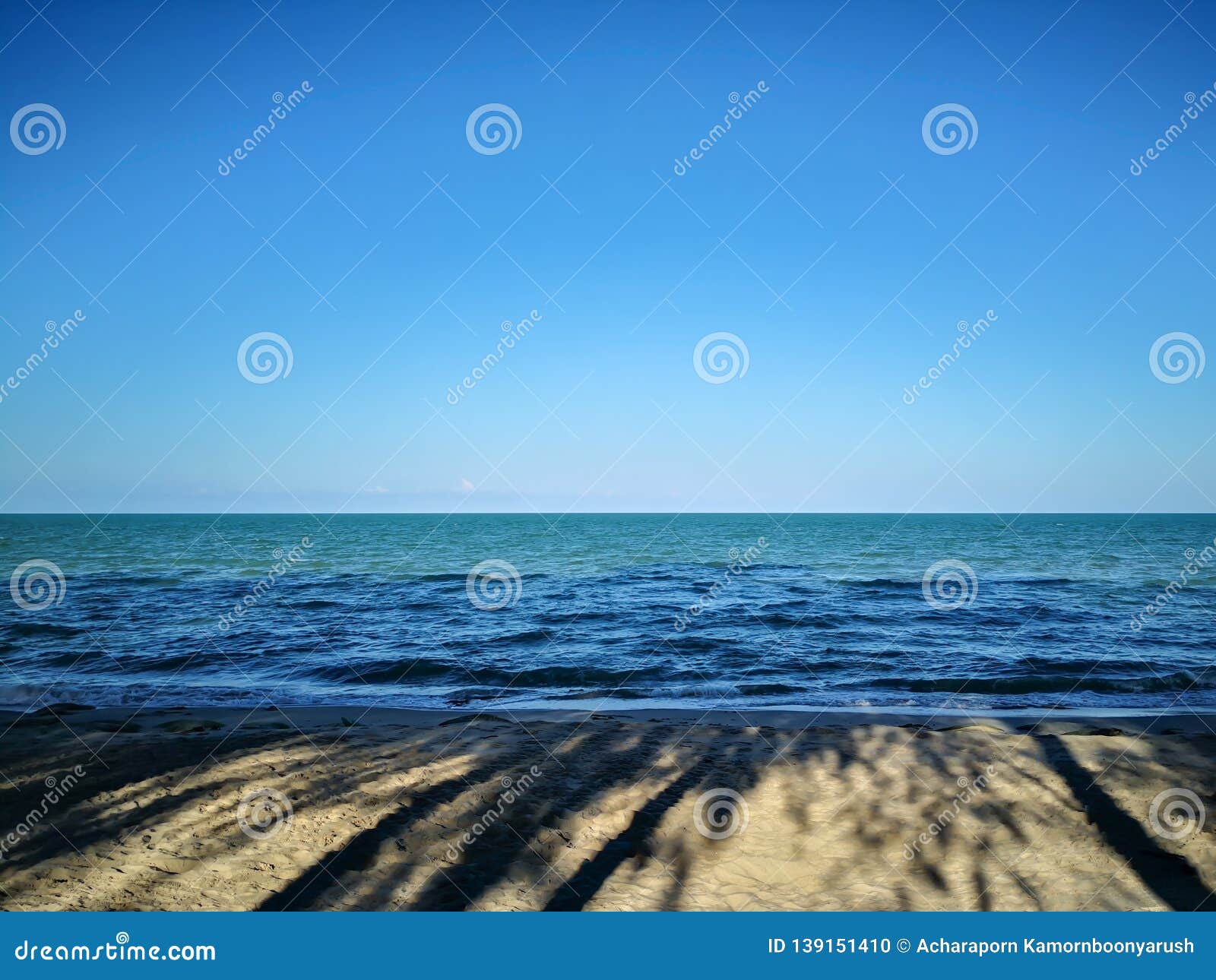 The Shadows of Morning Sun Beach Stock Photo - Image of landscape ...