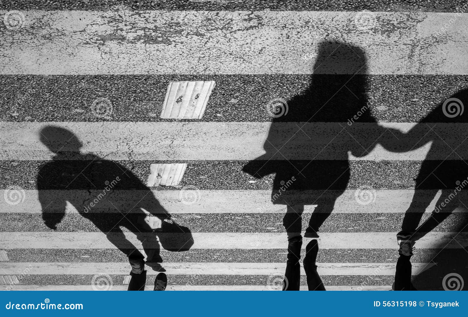Shadows of pedestrians stock photo. Image of town, city - 56315198