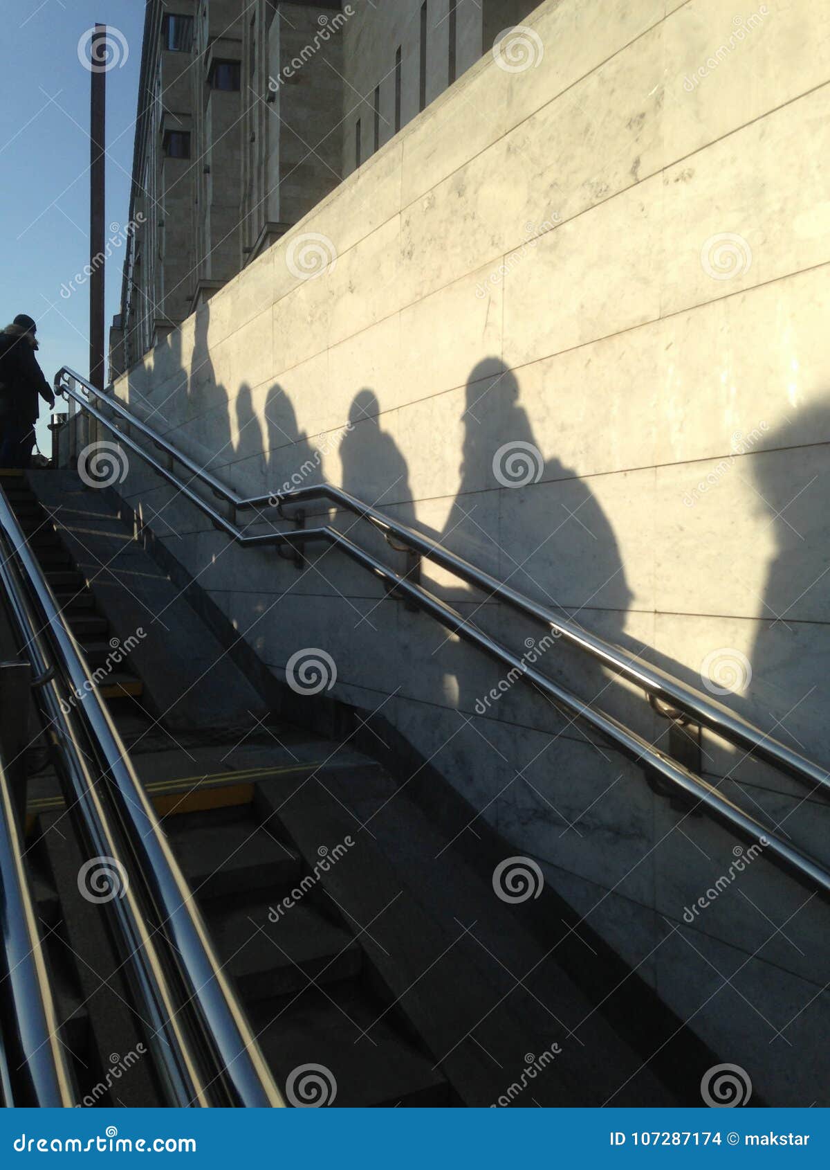 Shadows of People Going Out of a Subway Stock Photo - Image of morning ...