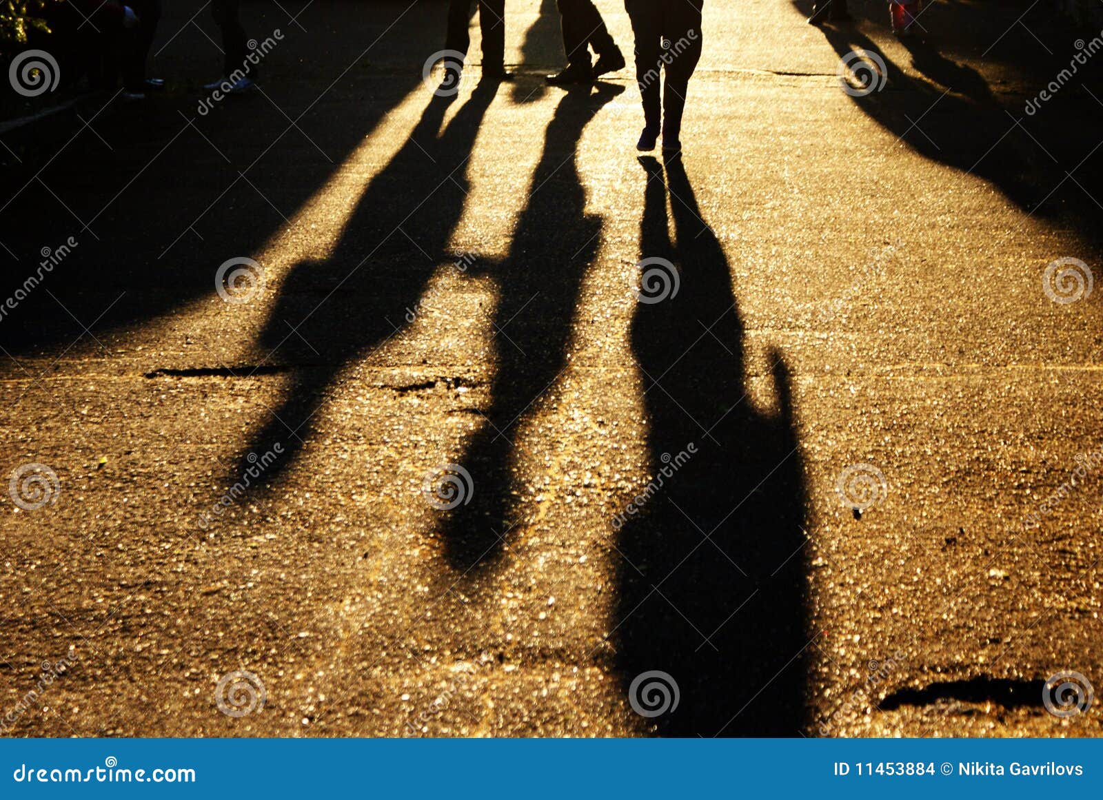 Shadows of people on road stock photo. Image of surface - 11453884