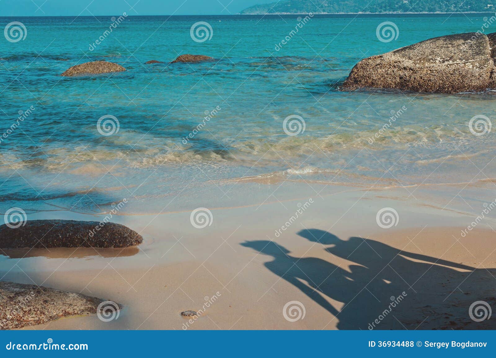 Shadows on the sand stock photo. Image of coastline, silhouette - 36934488