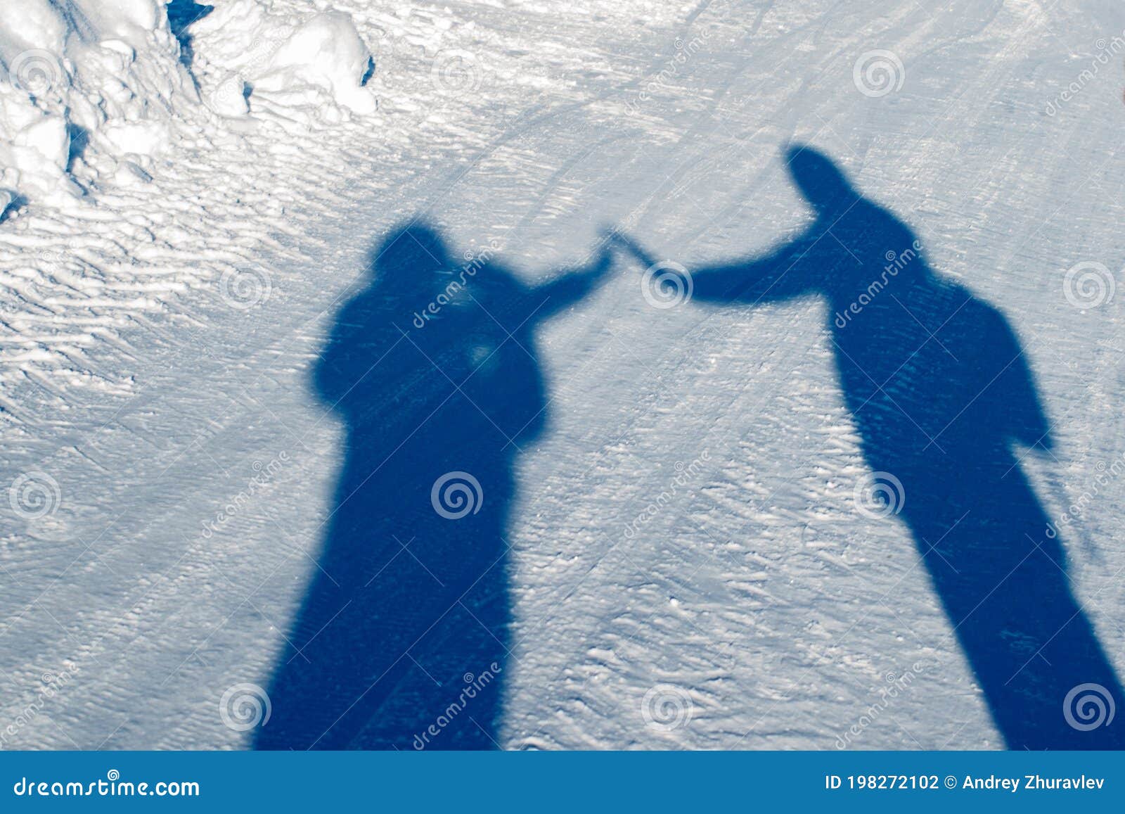 Shadows of Two Greeting People on White Snow Stock Photo - Image of ...