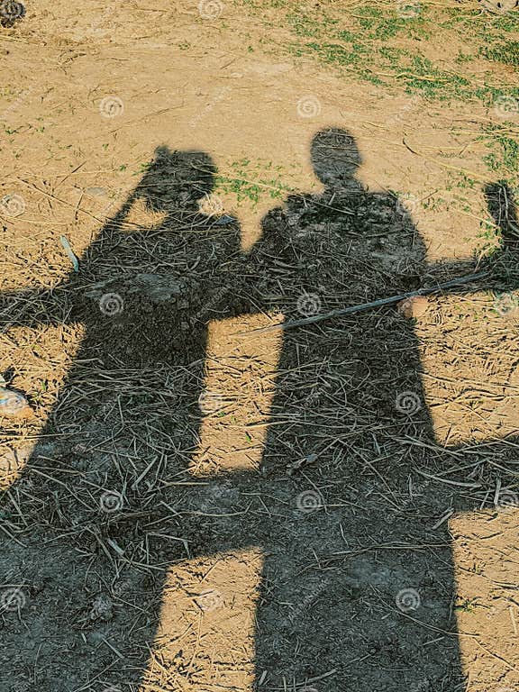 Shadows of Two Men Standing Stock Image - Image of standing, aesthetic ...