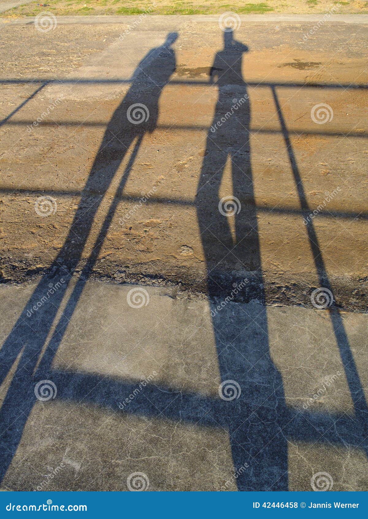 Shadows of Two People stock photo. Image of floor, ground - 42446458