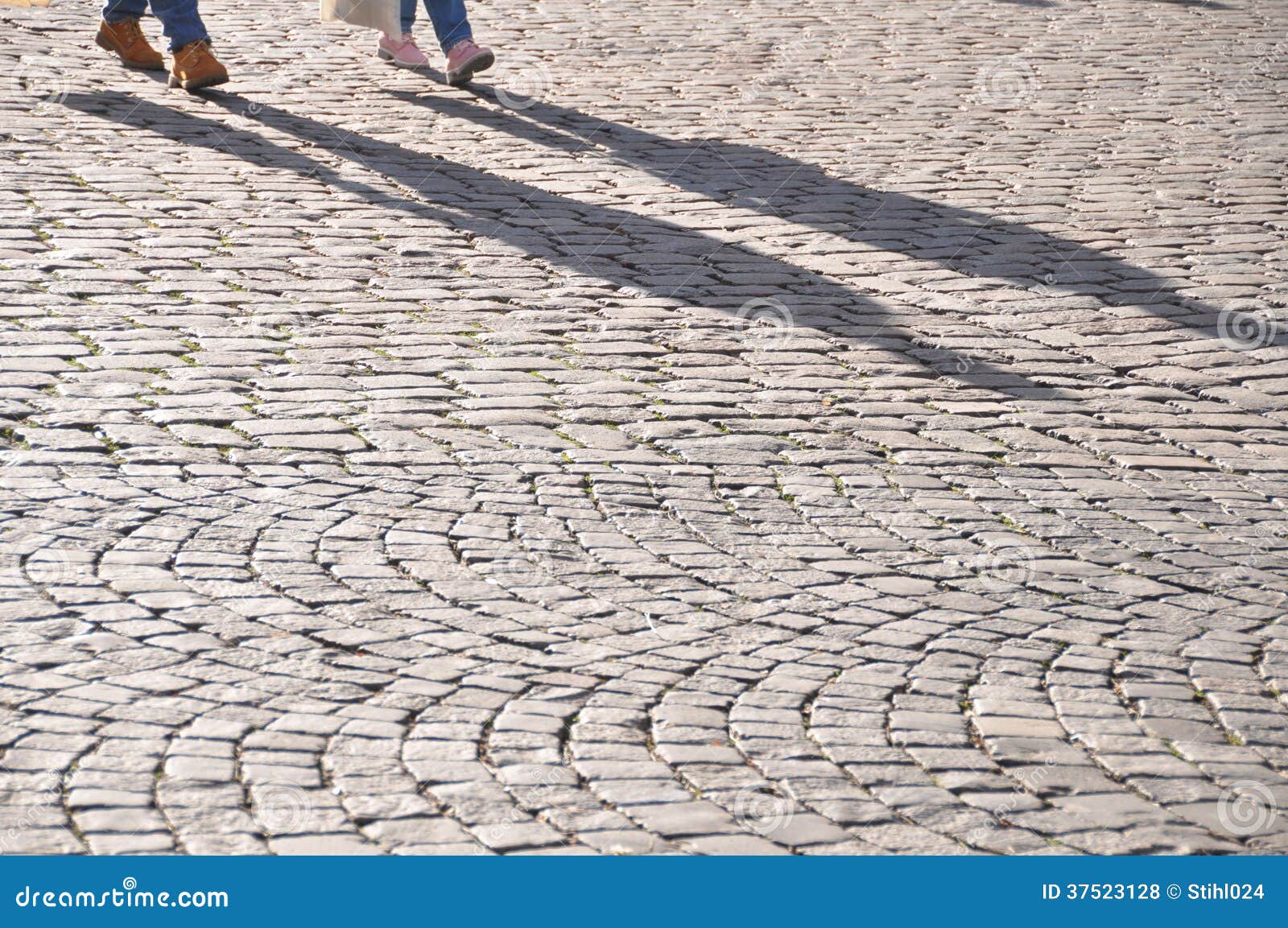 Shadows of walking feet stock photo. Image of detail - 37523128