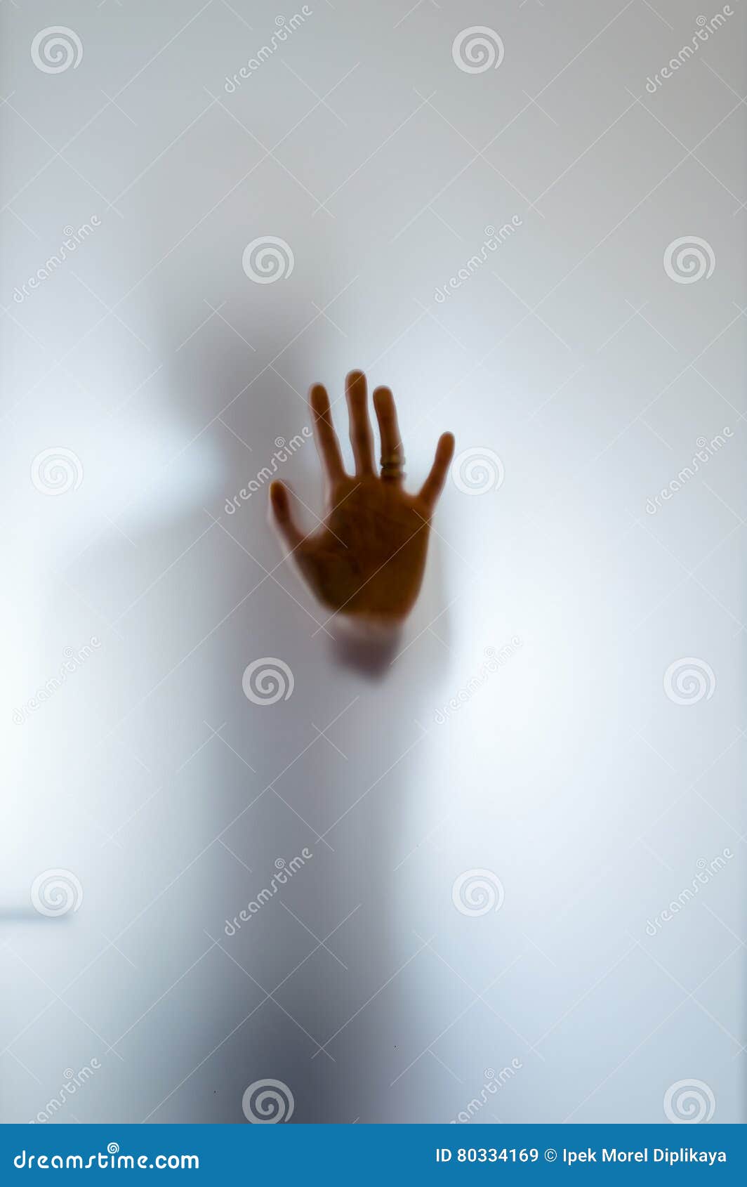 Shadowy Human Figure Behind a Frosted Glass Stock Image - Image of ...
