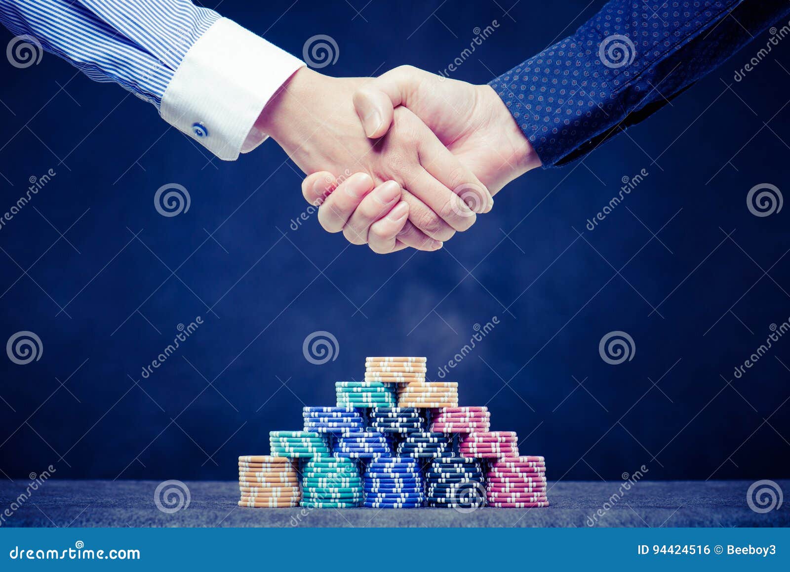 Shake Hands Over Stacked Coins Stock Photo - Image of hand, handshake ...