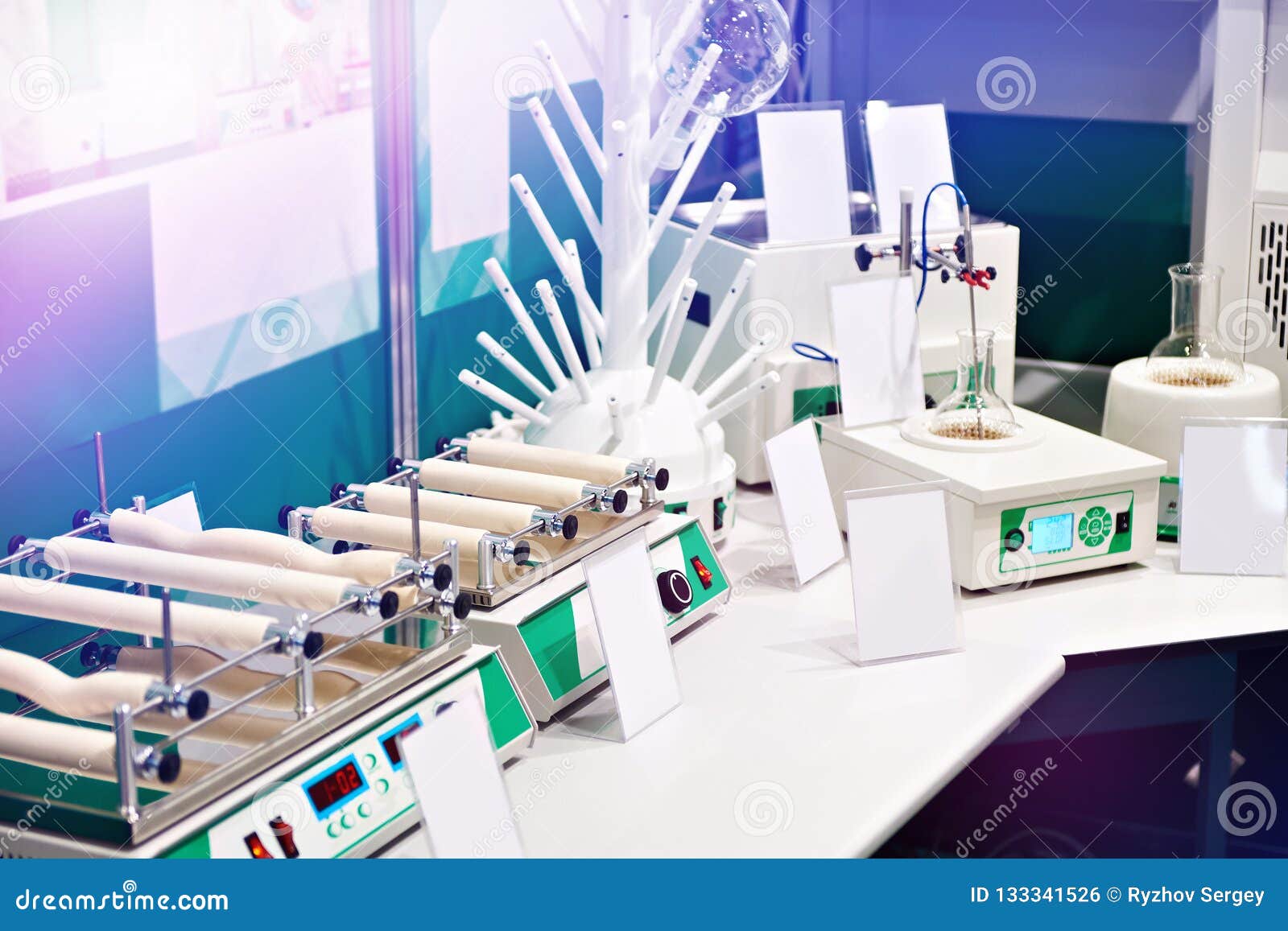 Shakers in Chemical Laboratory Stock Photo - Image of shake, flasks ...