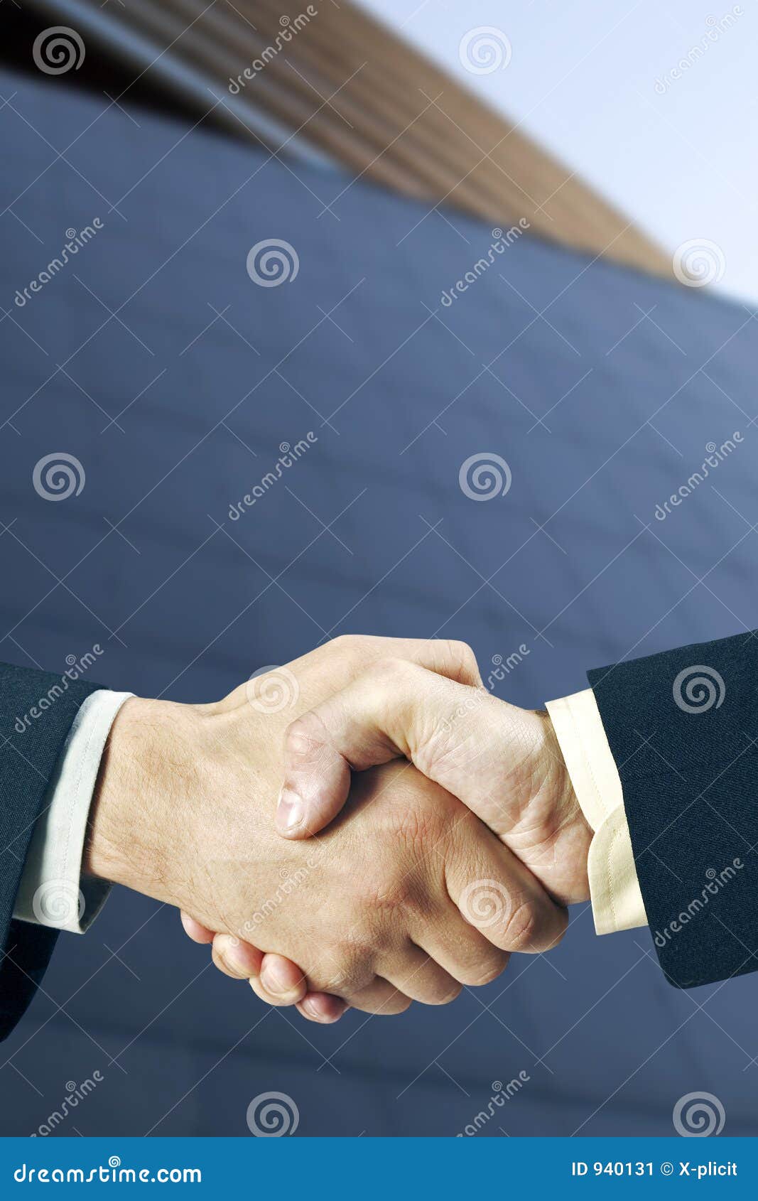 Shaking Hands in Front of a Building Stock Image - Image of grip ...