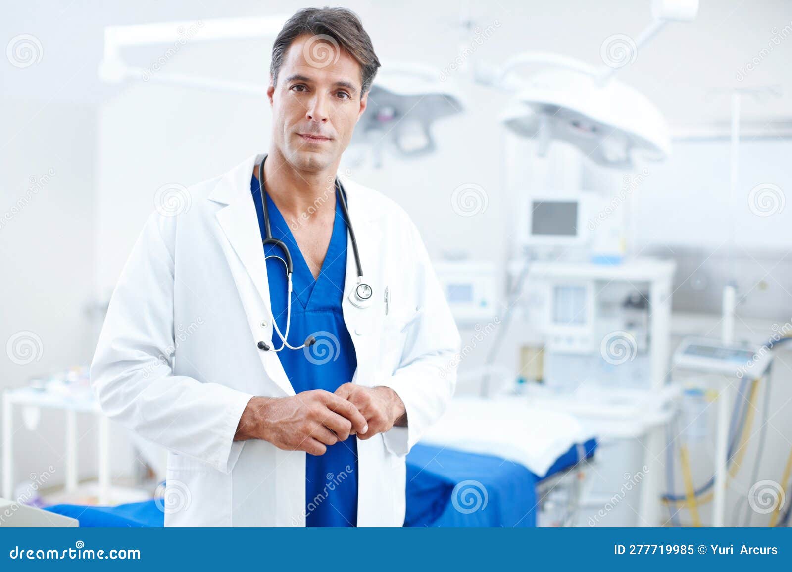 Shall we Get Started. a Confident Male Doctor Standing Infront of the ...