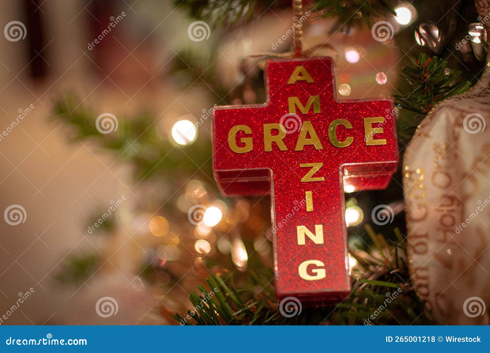 Shallow Focus of a Red Cross with Amazing Grace Text with Blur ...