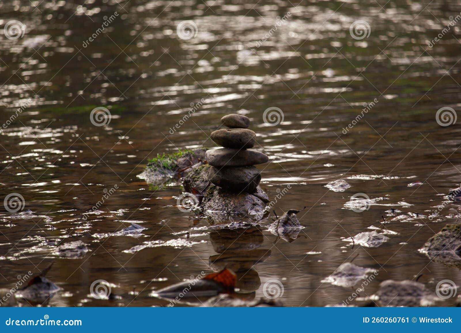 Shallow Focus Shot of a Stack of Balancing Rocks in the Water - Zen ...