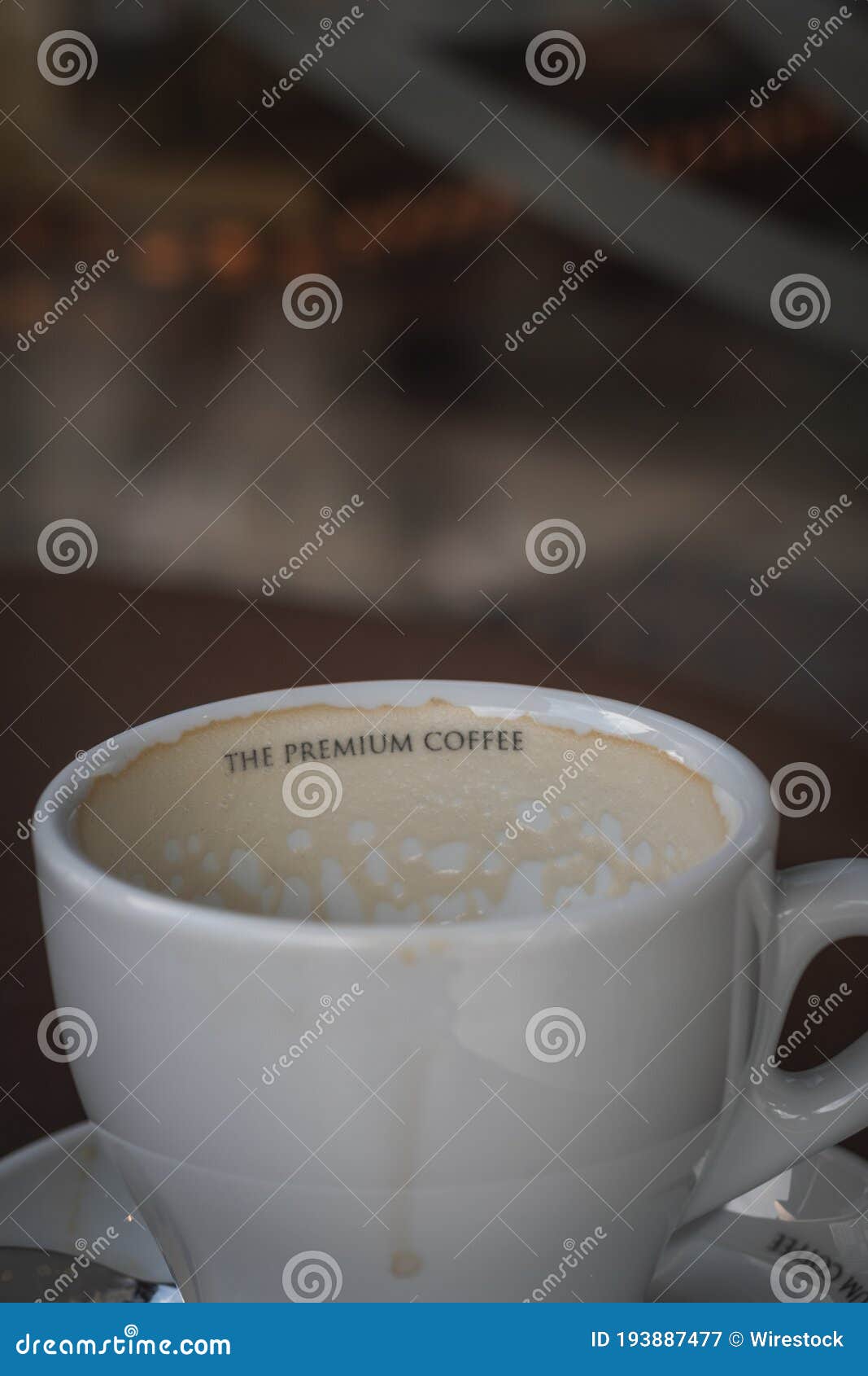 Shallow Focus Shot of a White Coffee Cup with a Text the Premium Coffee ...