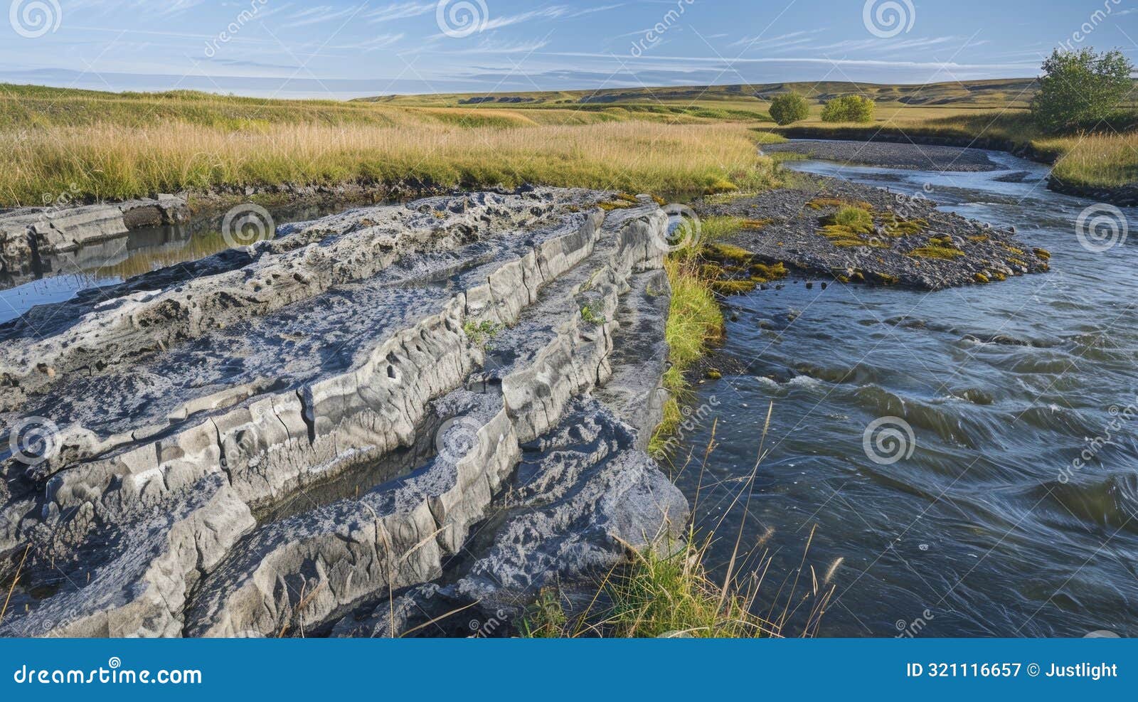 A Shallow River Flowing Over a Bed of Columnar Basalt the Water Rushing ...