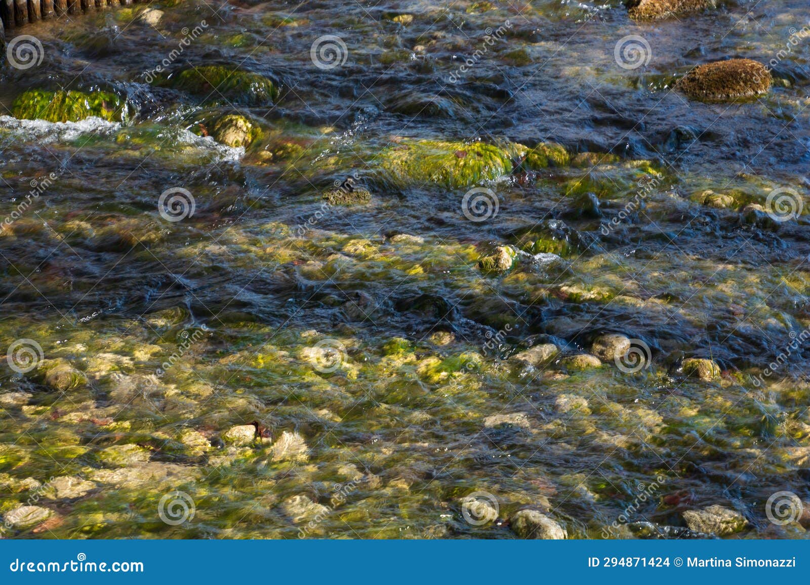 Shallow Rock Stream with Running Water with Light and Shadow Effects on ...