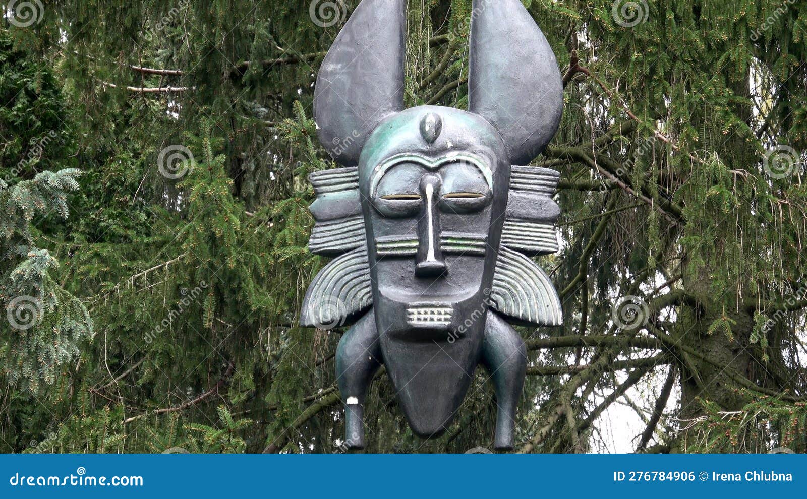 Shaman mask in the forest editorial photo. Image of decoration - 276784906