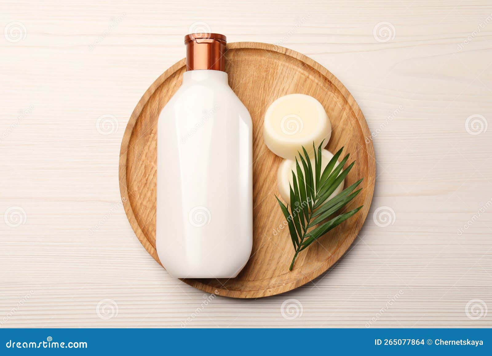Shampoo Bottle, Solid Shampoo Bars and Green Leaf on White Wooden Table ...
