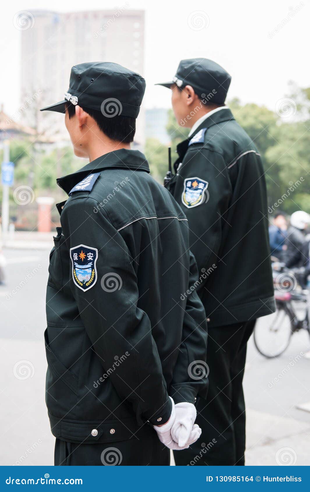 SHANGHAI, CHINA - April 2018: Two Security Guards Wait at the Gate of ...